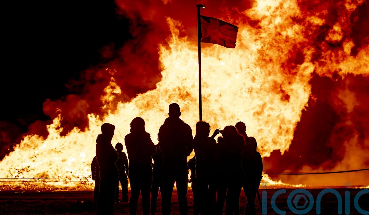 Police investigate NI election posters and flags on bonfires as hate ...