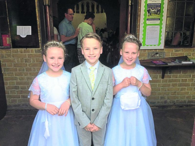 Mulvey triplets celebrate First Holy Communion in London - Leitrim Live